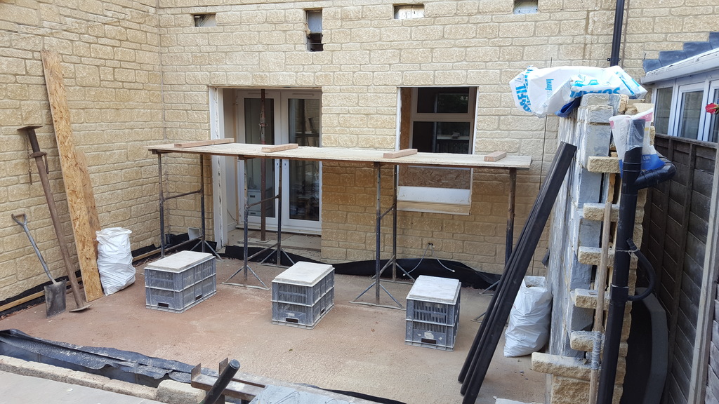 Continuous rod embedded between brick courses?